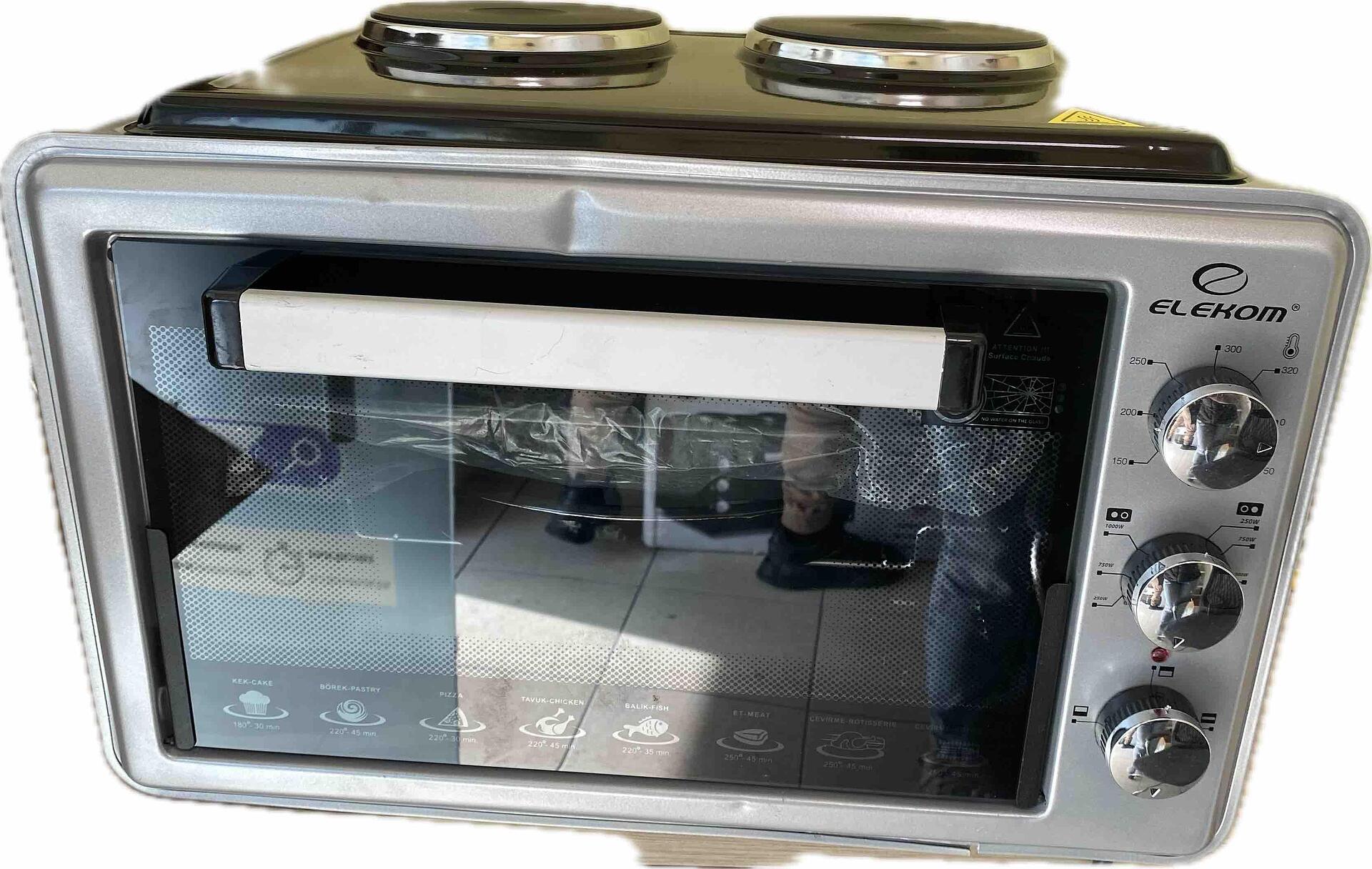 Разопакована Готварска печка Elekom (EK-1005OV) с транспотен дефект