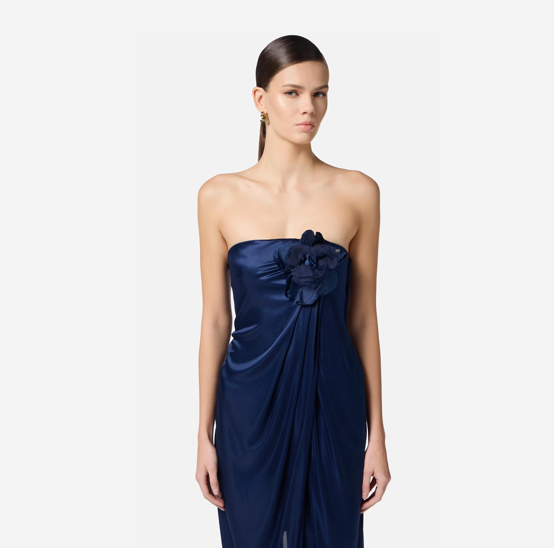 Red Carpet dress made of glossy jersey fabric with embroidered flower